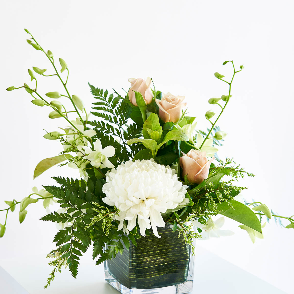 Leaf Wrap Arrangement in Glass Vase – Ann's Flowers